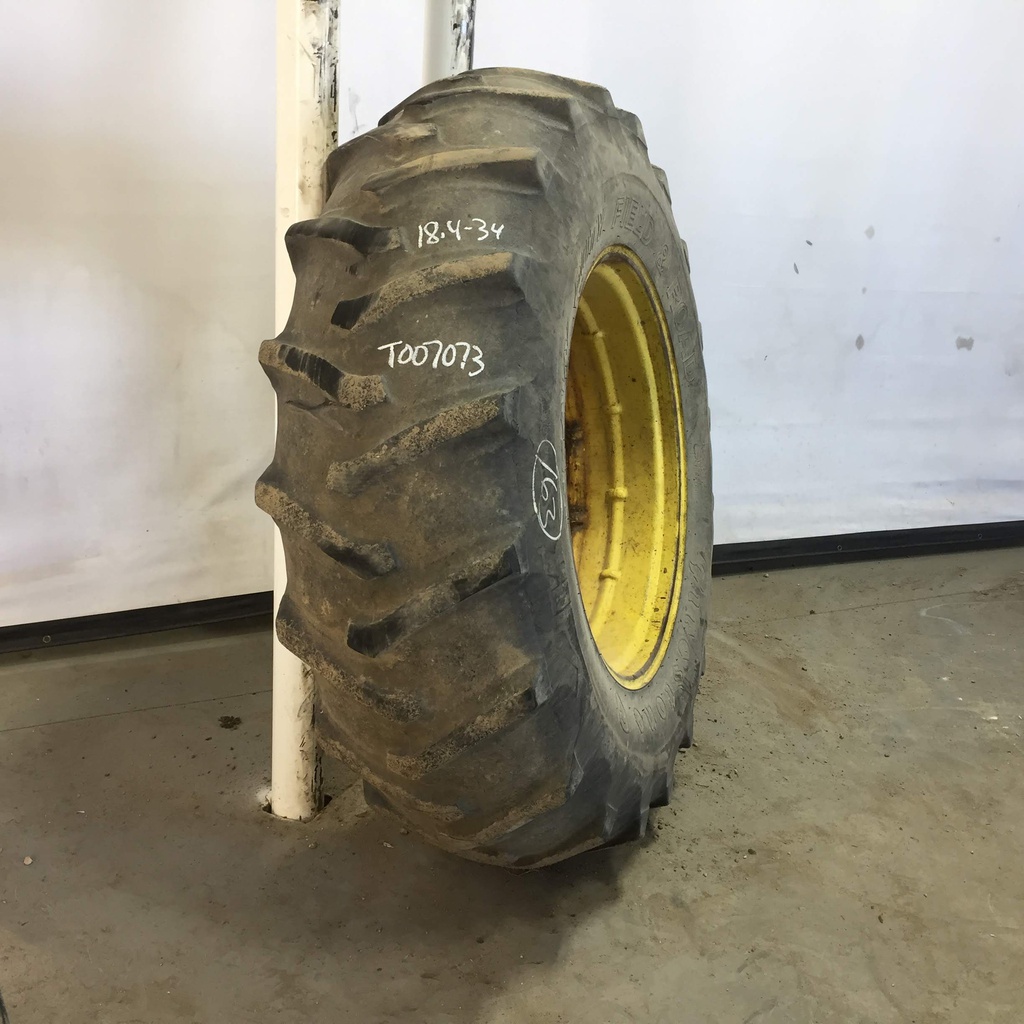 USED 18.4/-34 Firestone Traction Field & Road R-1 on John Deere Yellow ...